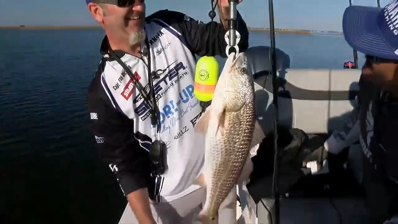 Rickard with a 8+ redfish - Bassmaster